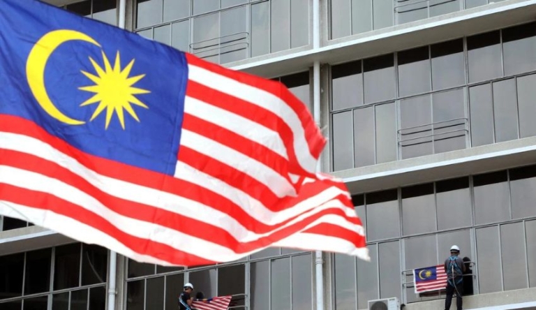 Malaysia's new rule: Aid for 'Red IC' holders & orphans